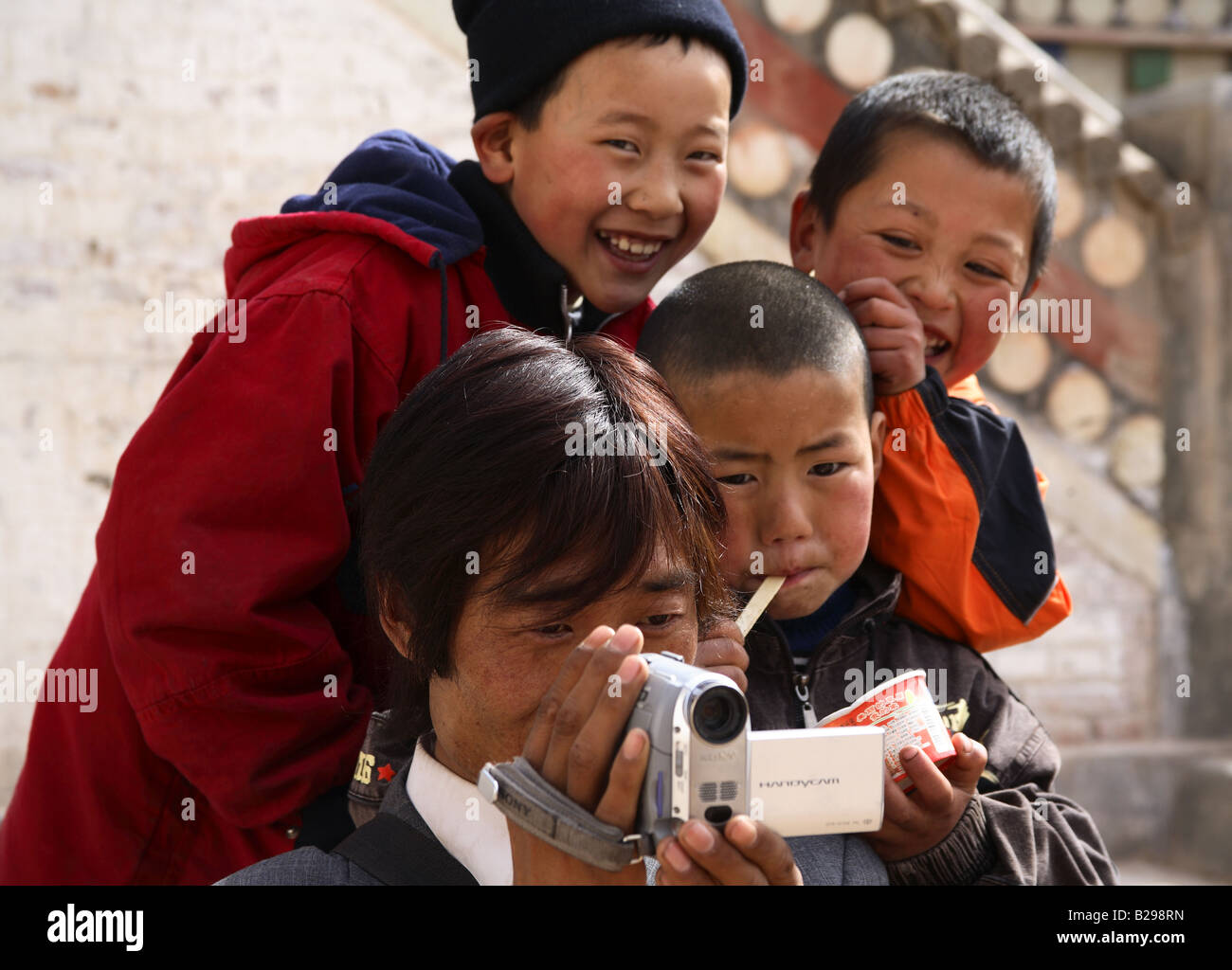 children enjoying a video camera Stock Photo - Alamy
