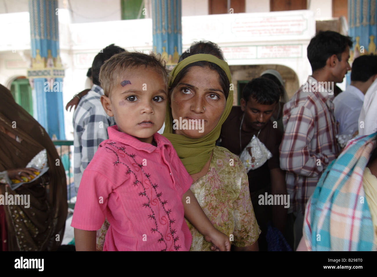 A woman and child in Hindu temple, Pushkar, India Stock Photo - Alamy