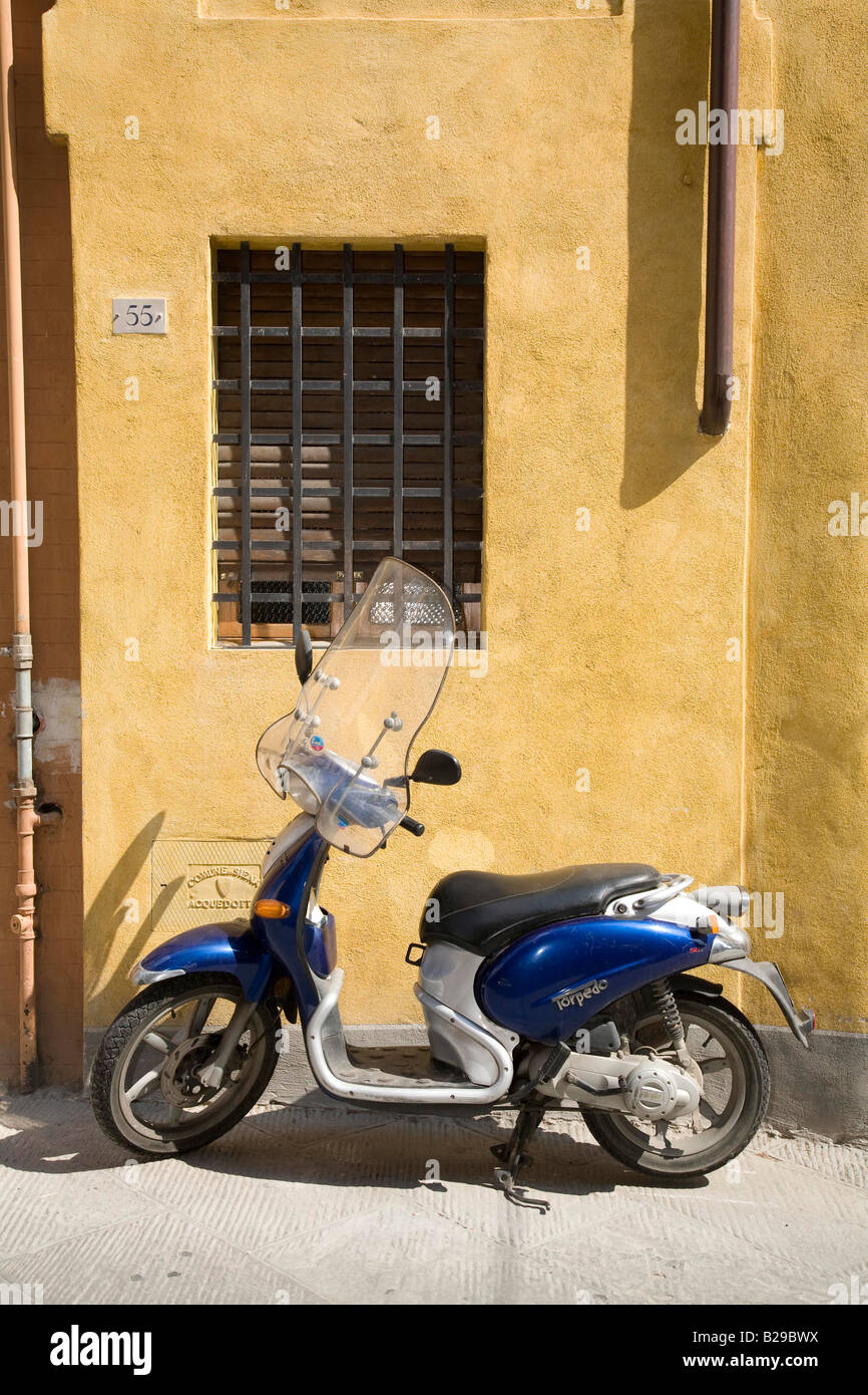 Scooter parked in front of house in Siena Tuscany Italy Europe Stock ...