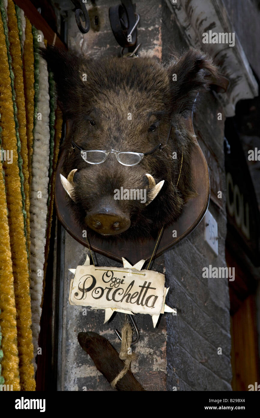 Wild boar s head mounted on board Sign reads porchetta oggi translates ...