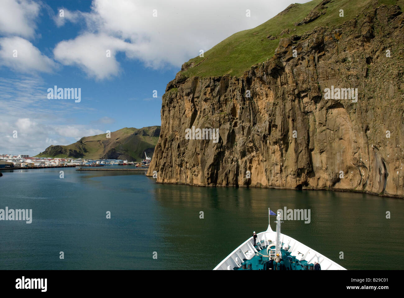 Heimaey harbour entrance volcanic cliffs Westman Isles Iceland Stock ...