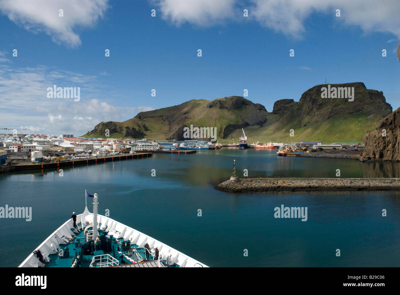 Heimaey harbour entrance volcanic cliffs Westman Isles Iceland Stock ...