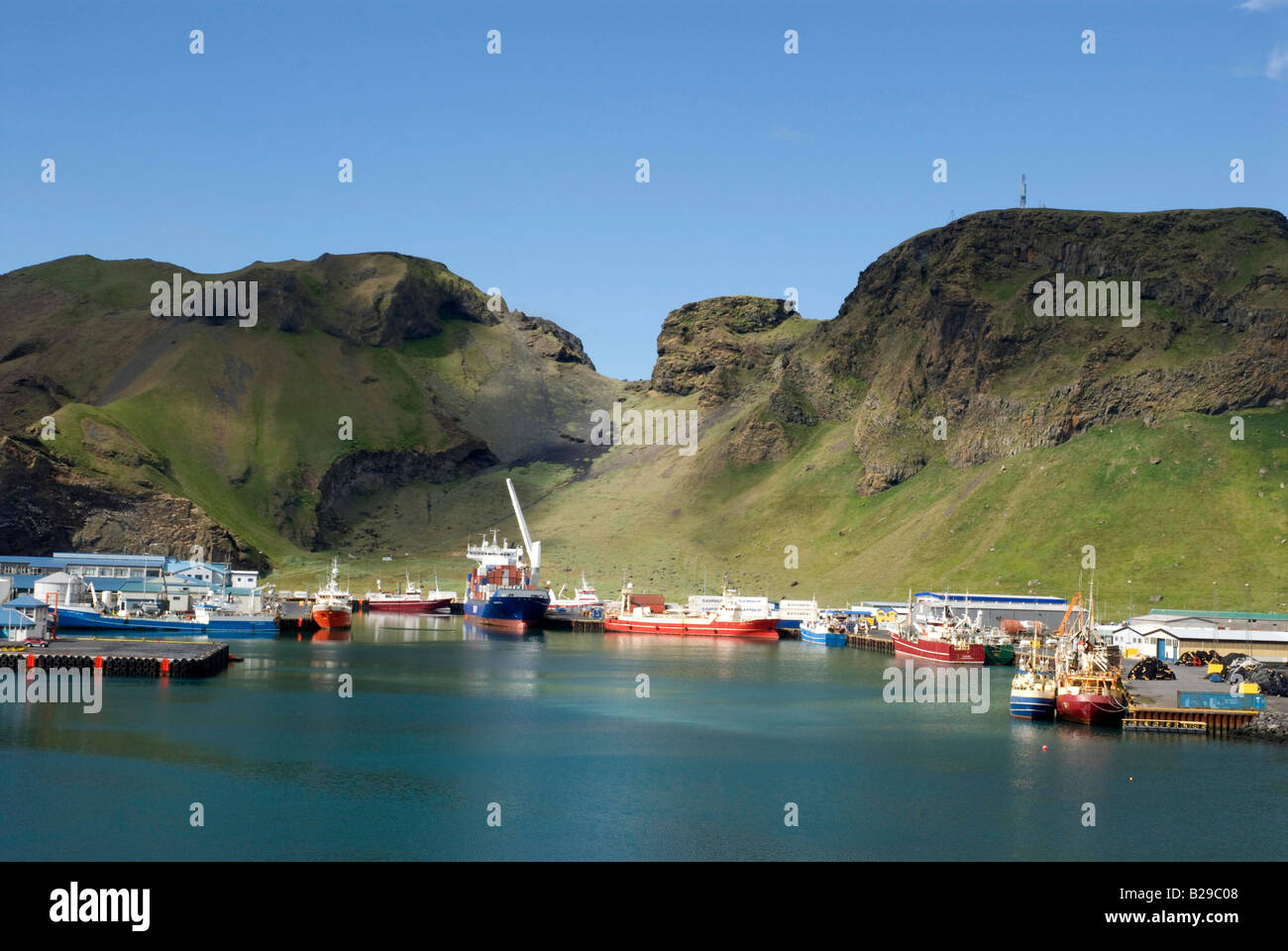 Heimaey harbour entrance volcanic cliffs Westman Isles Iceland Stock ...