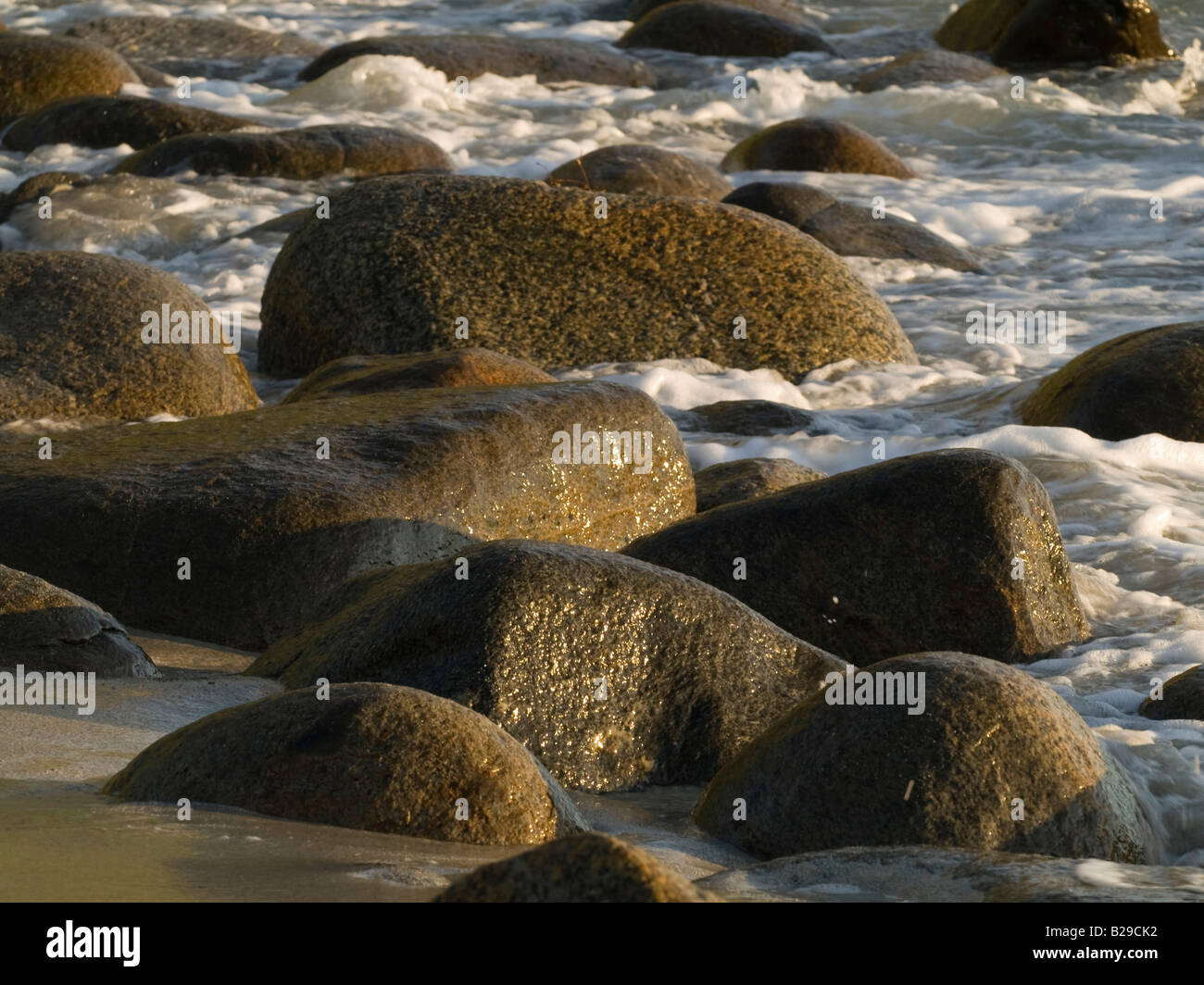 Boulders at coast Stock Photo - Alamy