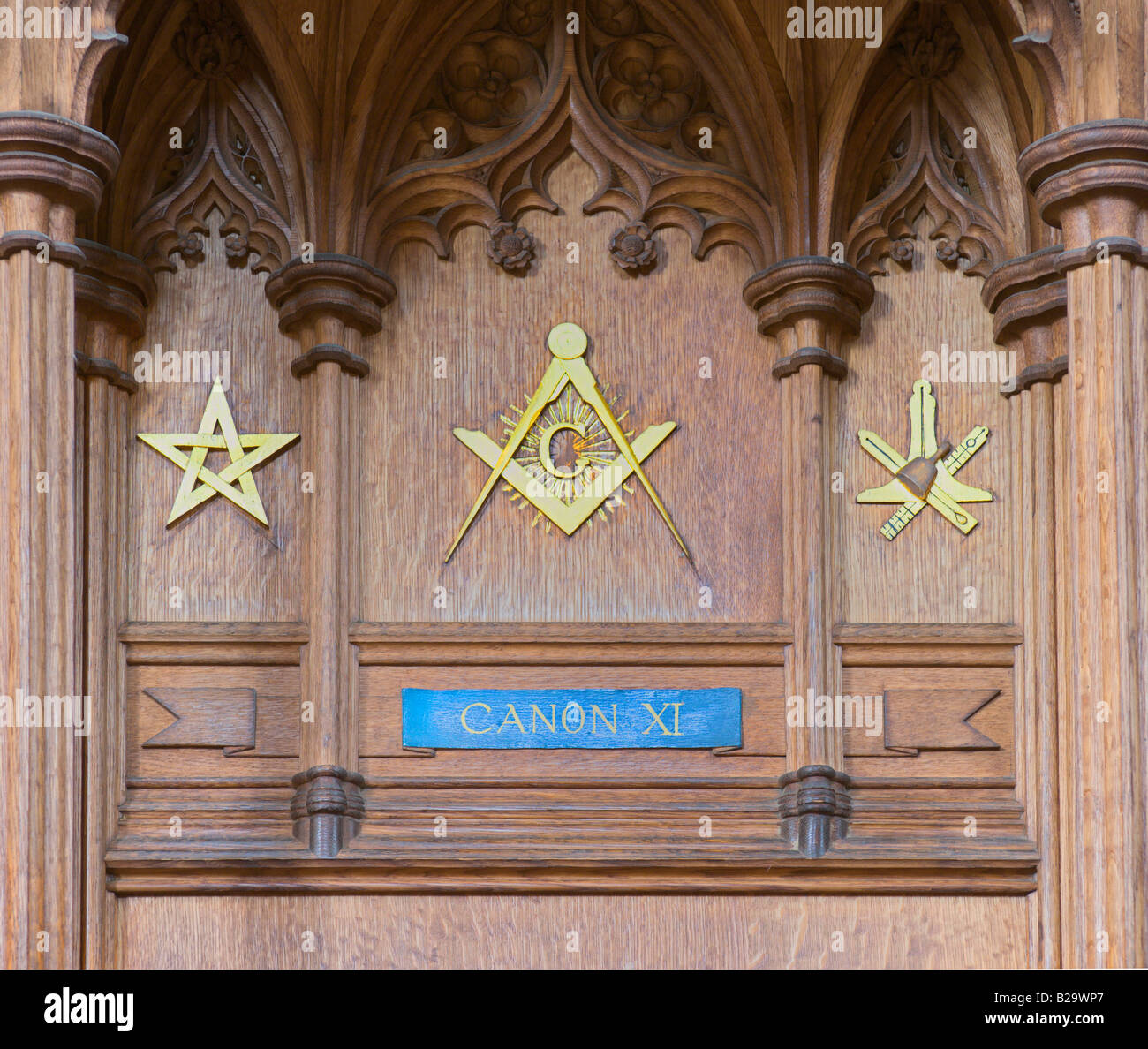 Peterborough cathedral, wooden choir stall with emblems Stock Photo - Alamy
