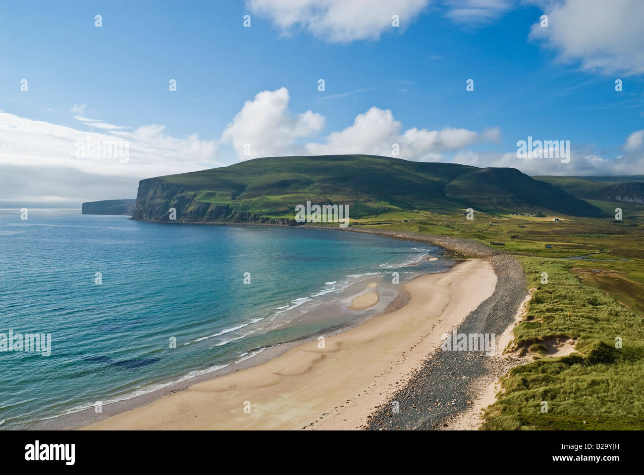 Clear waters and green hillsides of Rackwick Bay on the island of Hoy ...