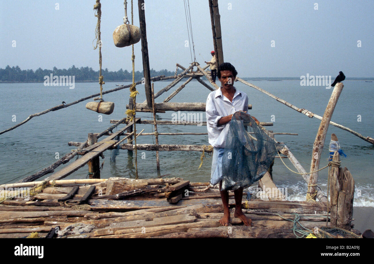 South India Kerala Kochin Fishing Village Fishermen Boats and Nets ...