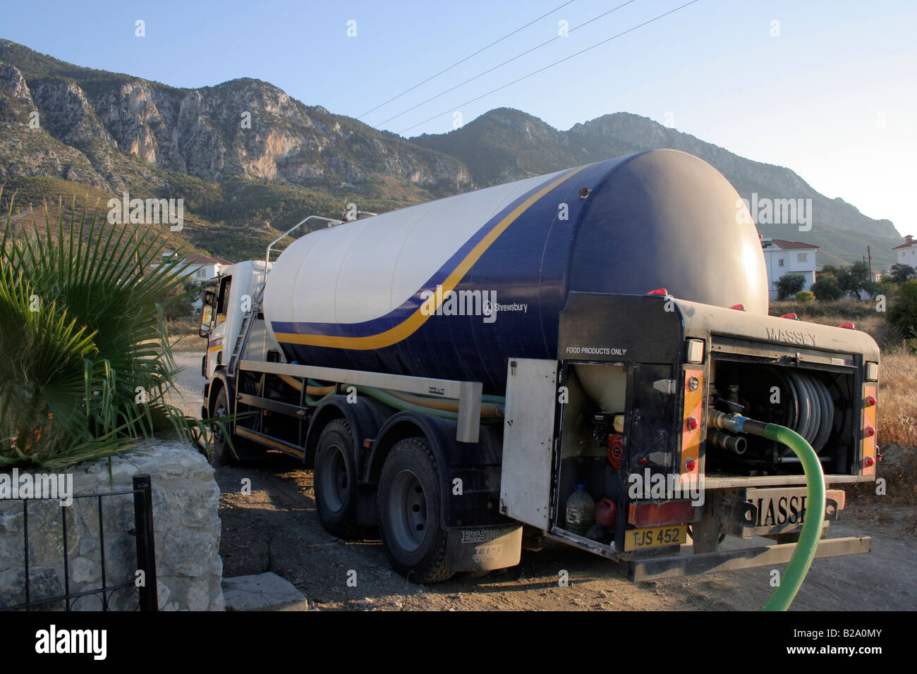 Tanker Topping up the Swimming Pool Stock Photo - Alamy