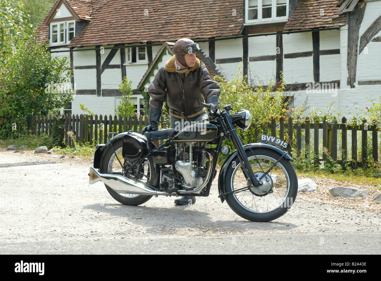 classic british velocette motorbike with rider in period clothing with ...