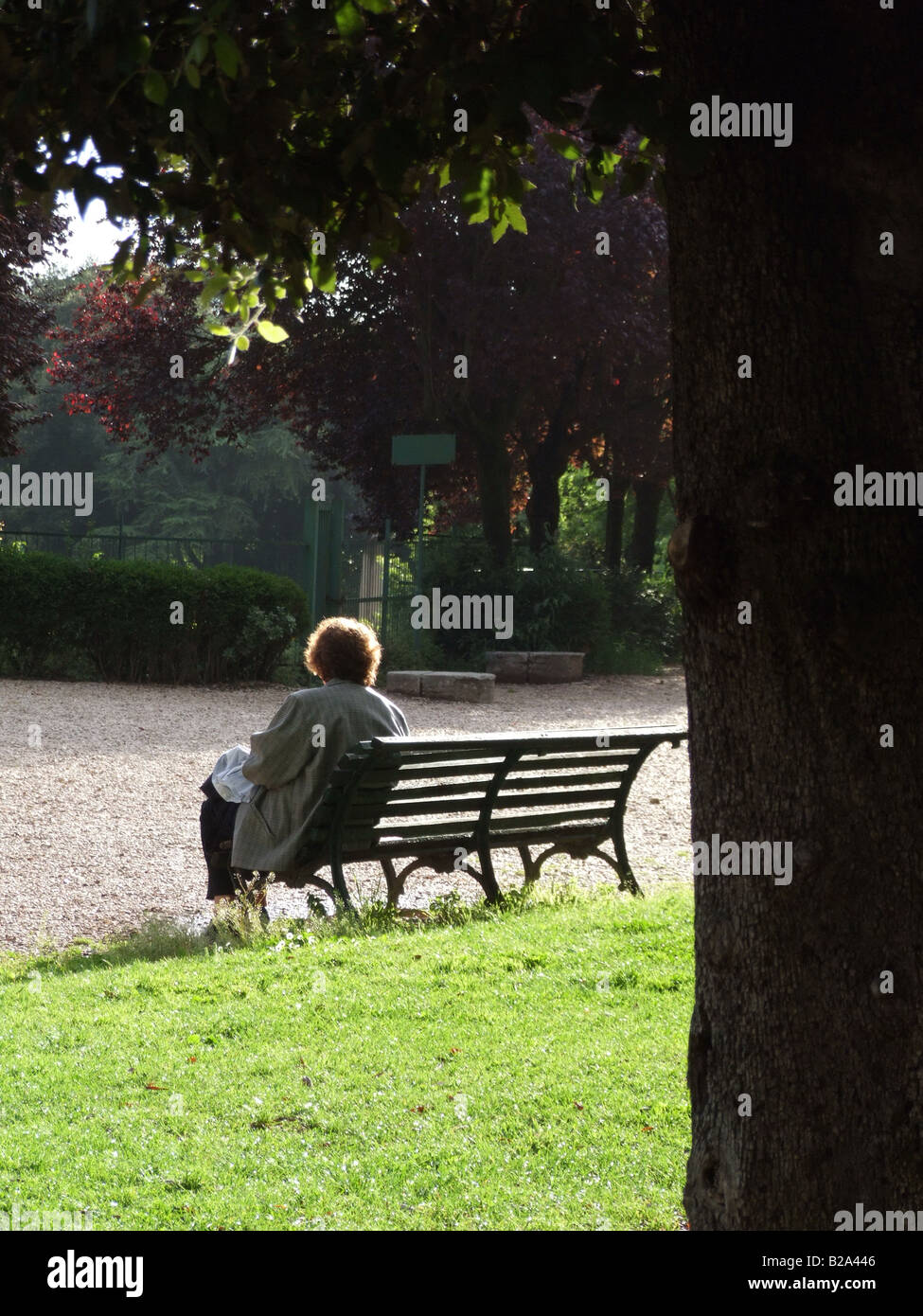 Person sitting on bench in villa borghese hi-res stock photography and ...