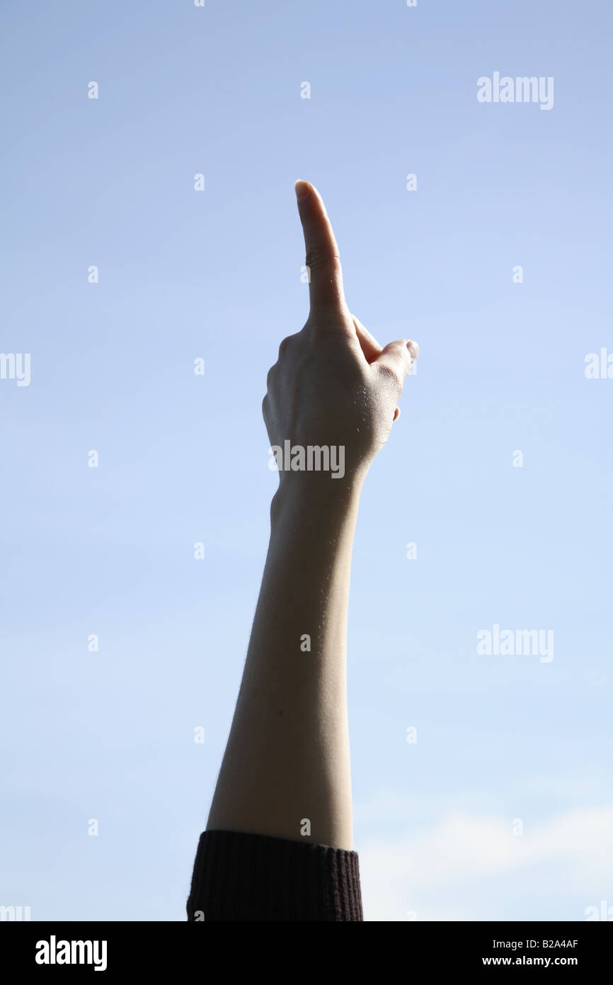 female hand with one finger point toward the sky Stock Photo - Alamy