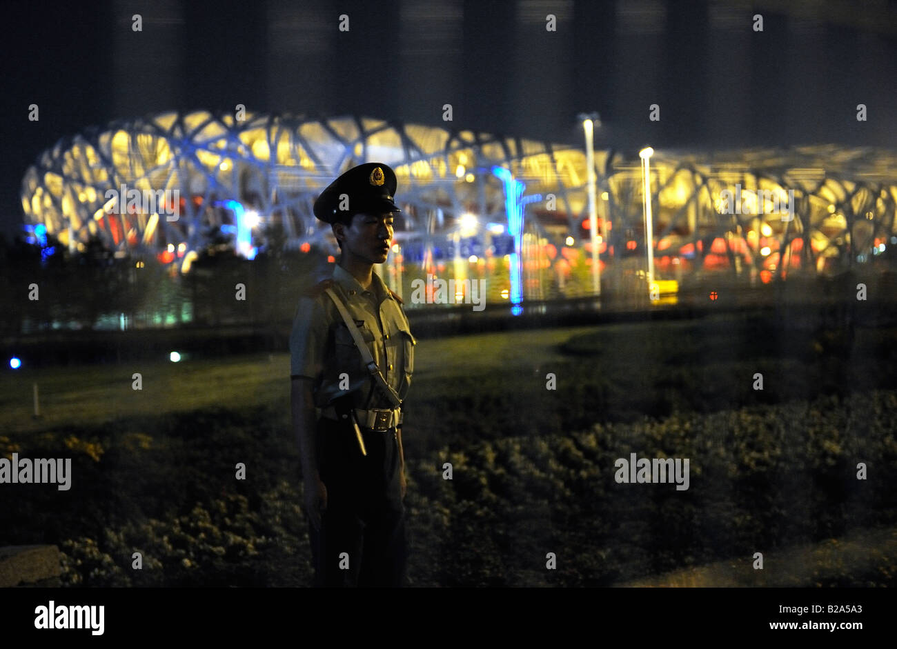 PLA soldier on guard in front of National Stadium in Beijing, China. 22 ...