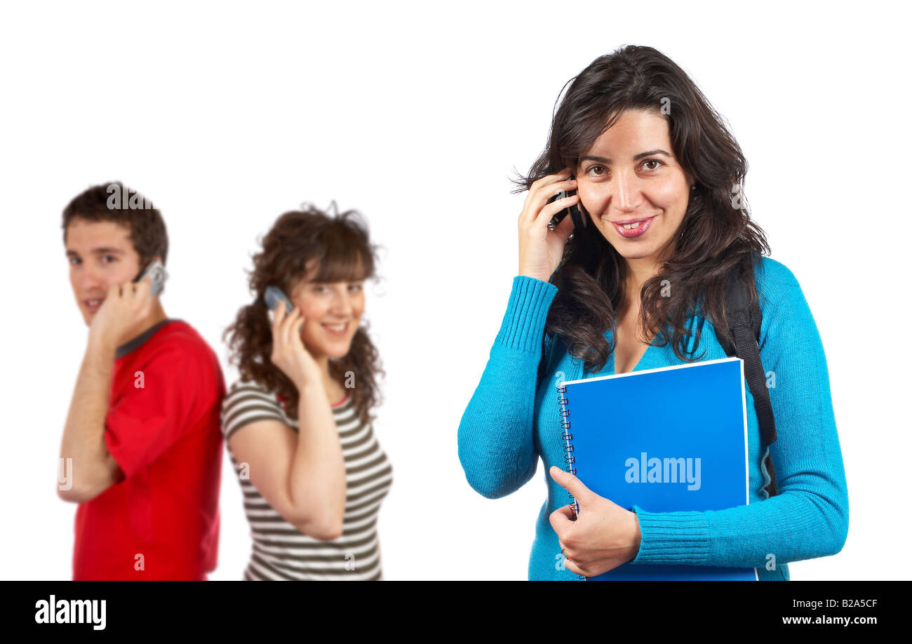 Three students talking with phone over a white background Focus at ...