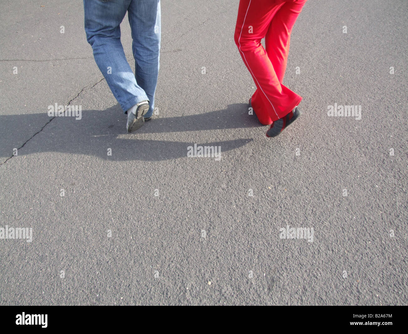 one person walking in street in city town Stock Photo - Alamy