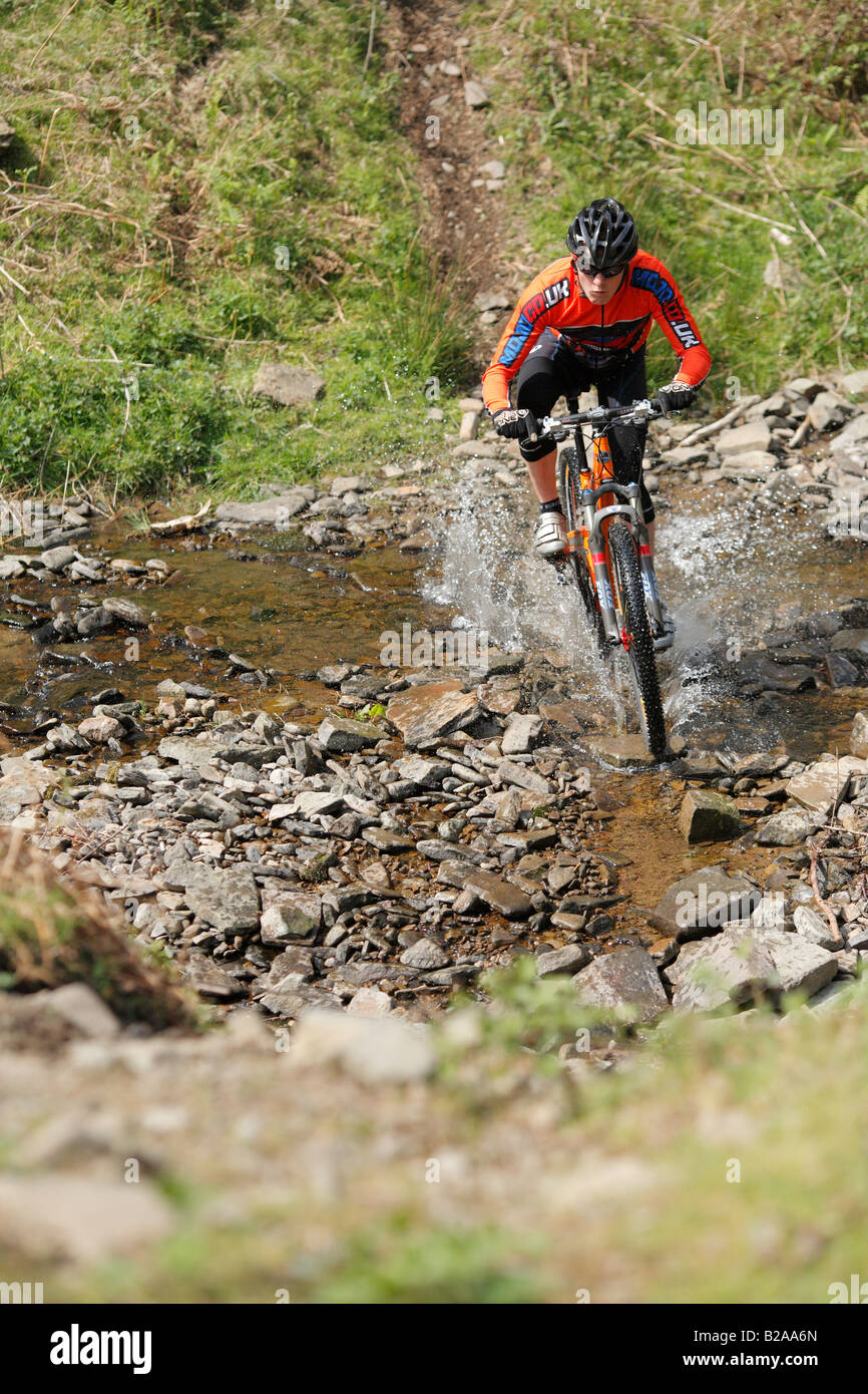 Cycling through water hi-res stock photography and images - Alamy