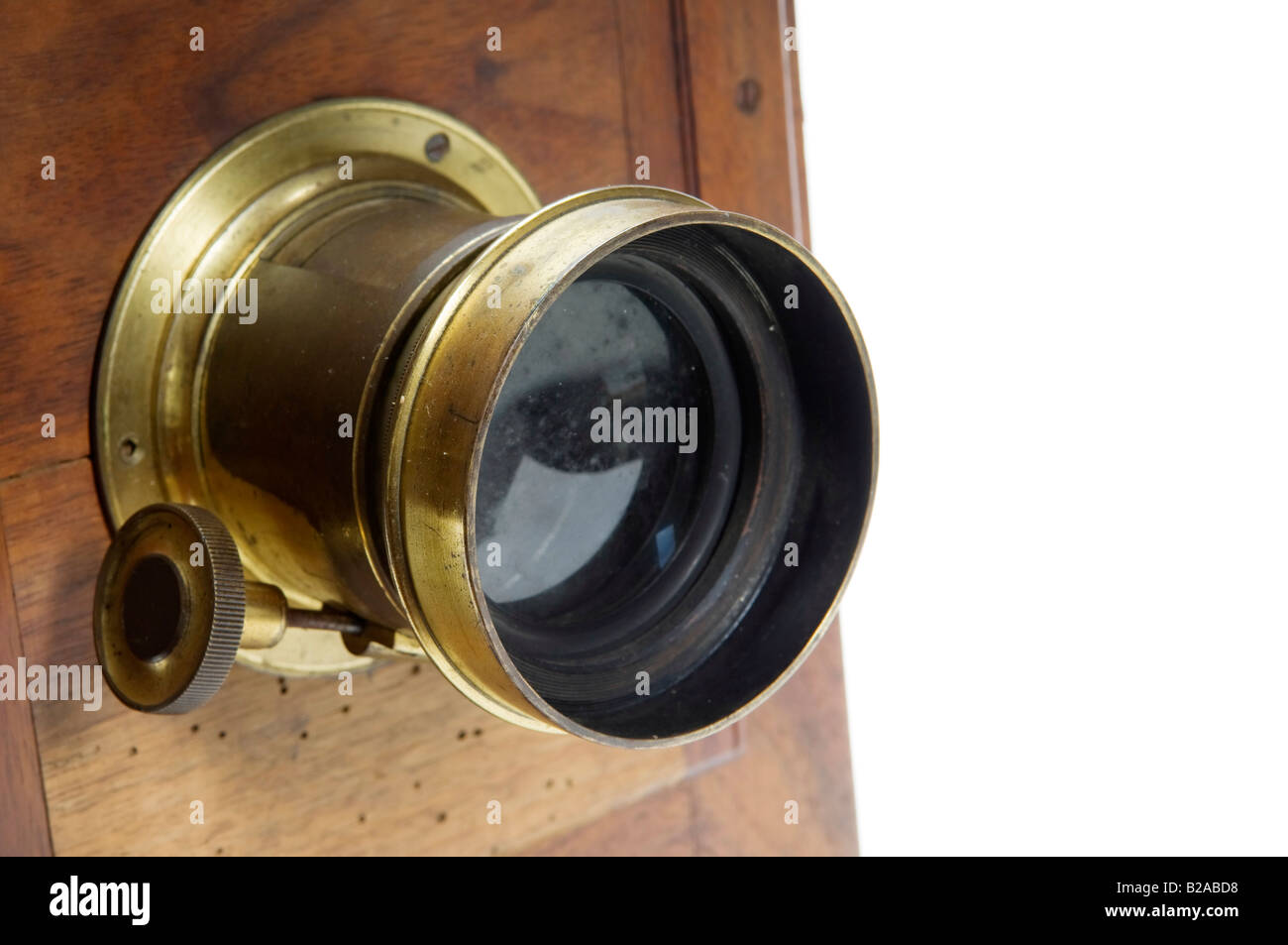 Detail of a vintage wooden camera showing the old lens Stock Photo - Alamy