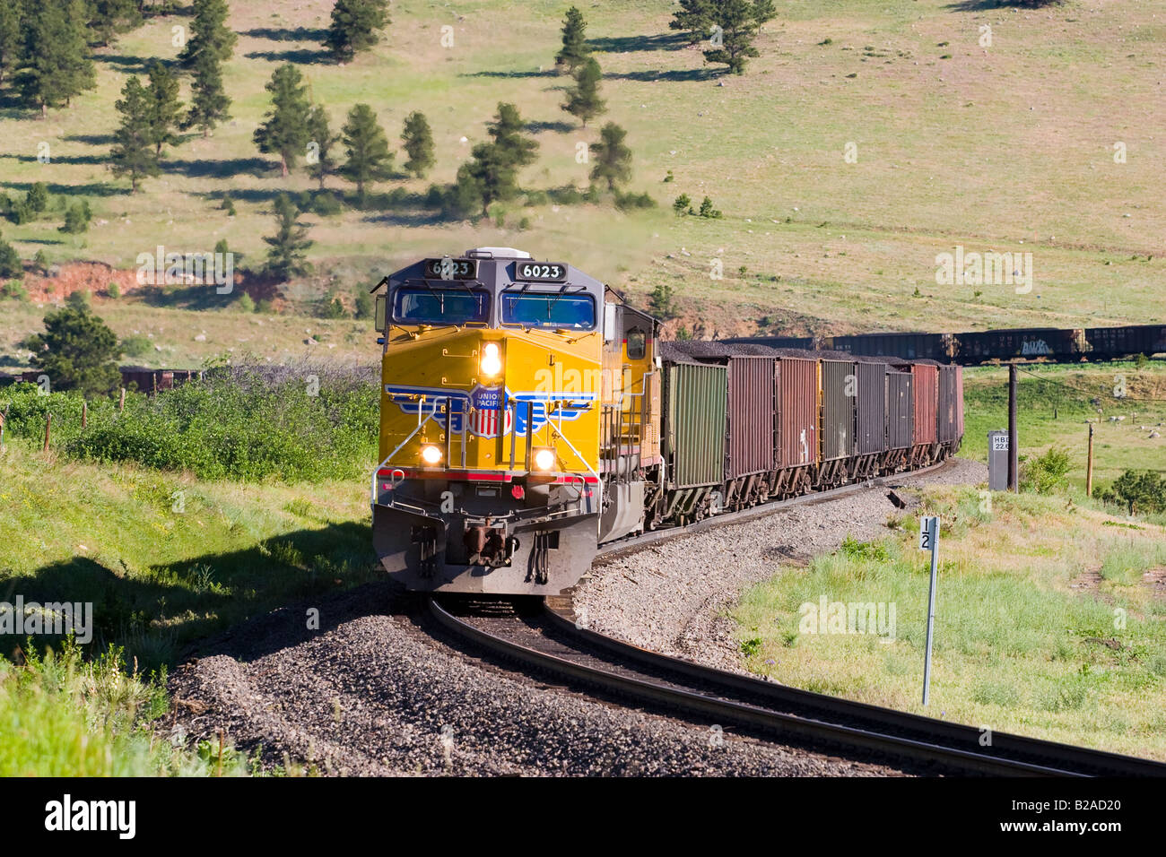 A Union Pacific coal train descends the Rocky Mountains headed towards ...