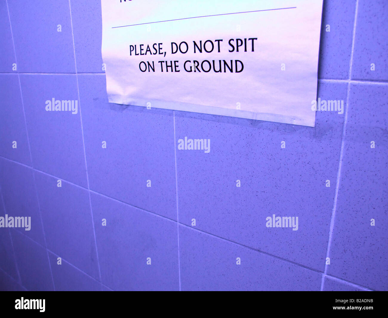 please do not spit on the ground sign in public toilet Stock Photo - Alamy