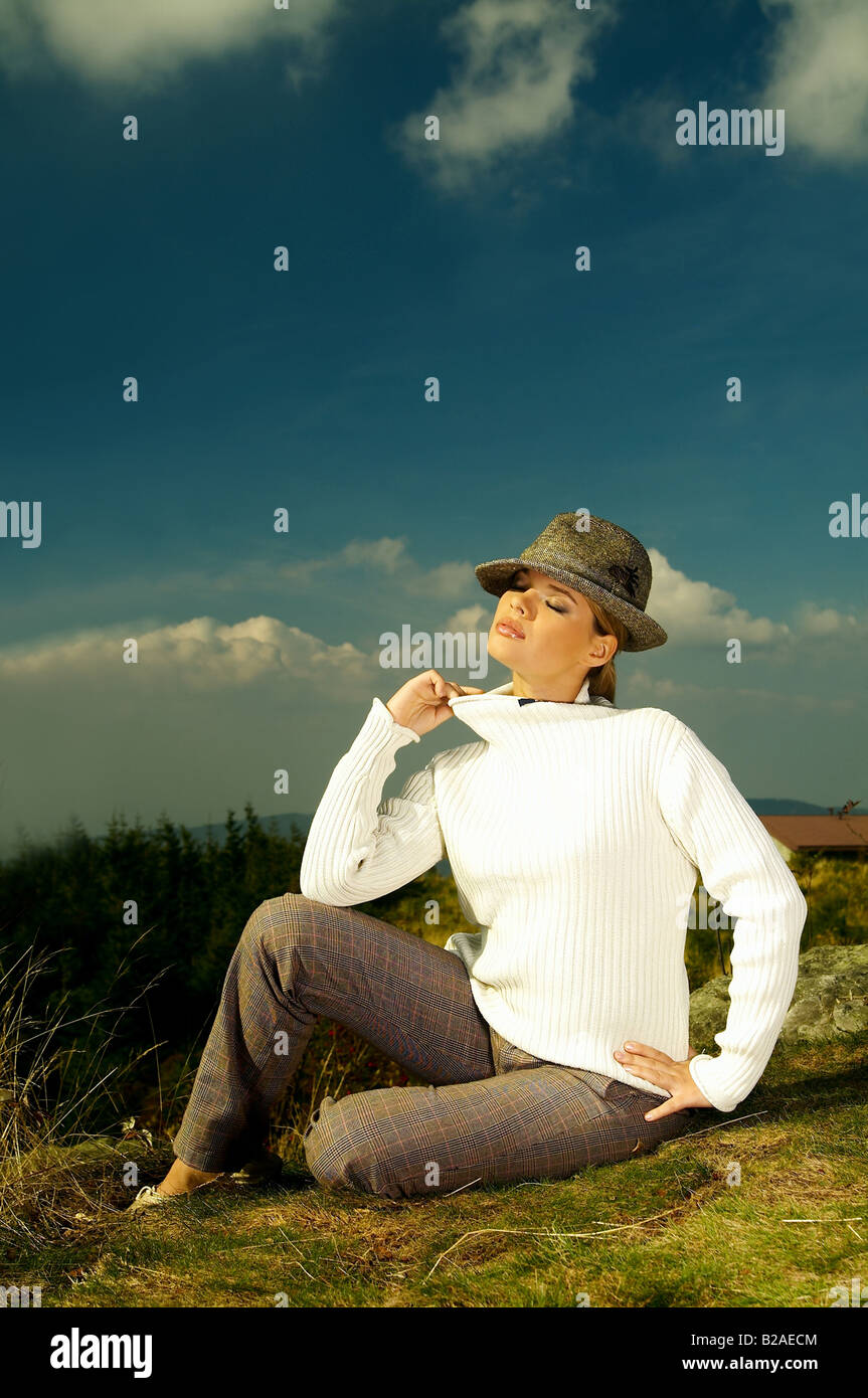 Young beautiful model posing in mountain outdoor scenery Stock Photo ...