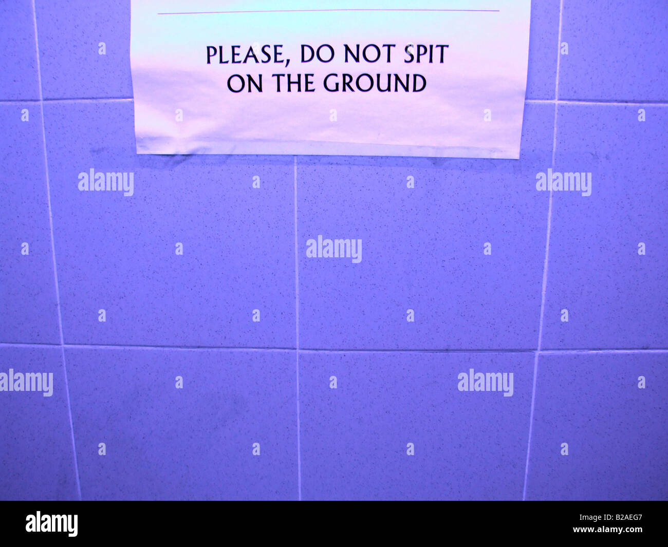 please do not spit on the ground sign in public toilet Stock Photo - Alamy