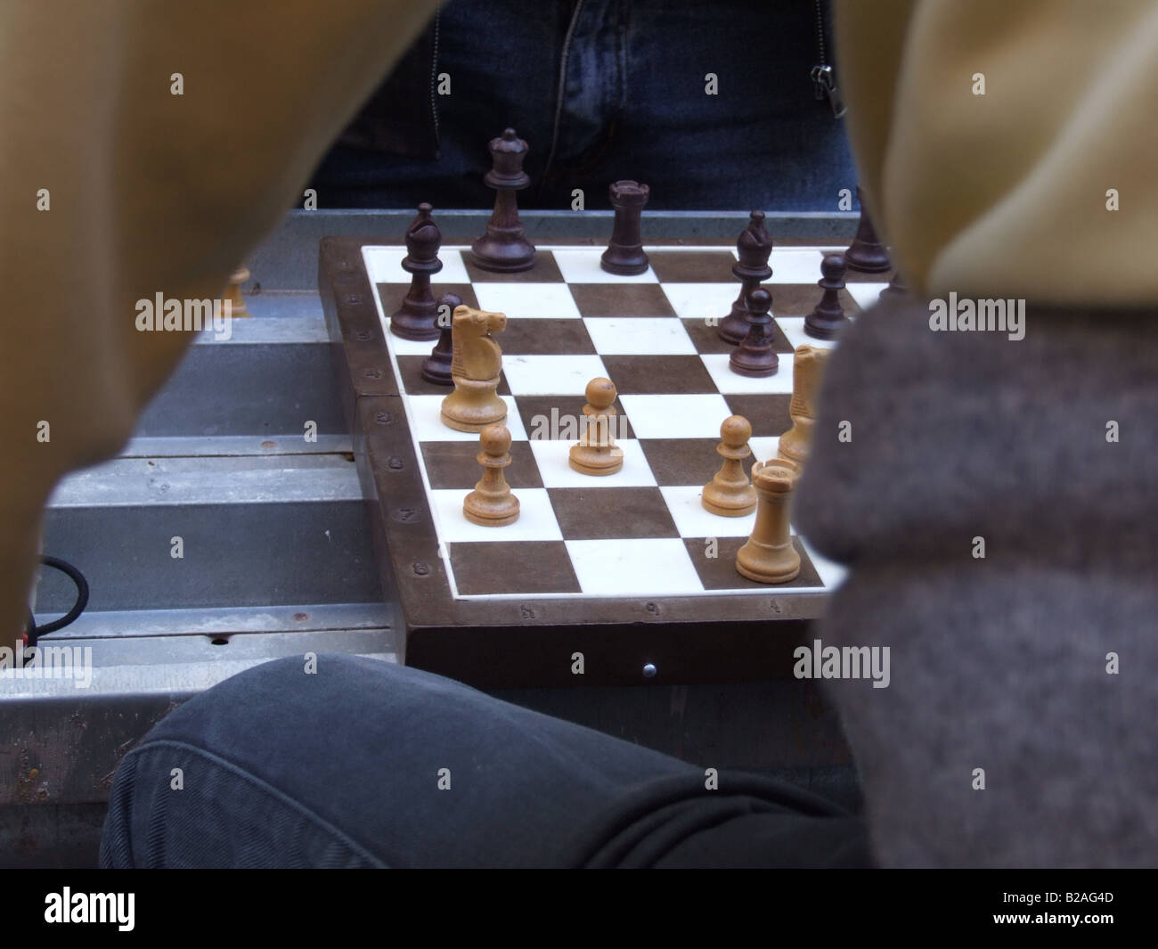 two men playing chess game outdoors Stock Photo - Alamy