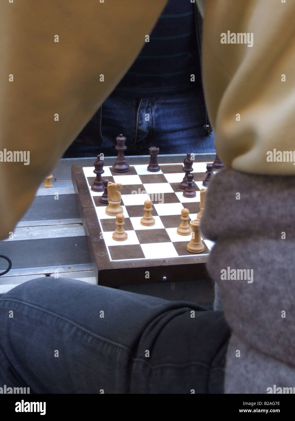 two men playing chess game outdoors Stock Photo - Alamy