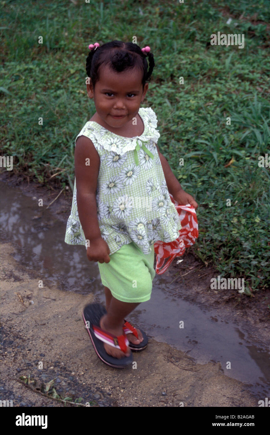 Coy young black girl in the town of Bocas del Toro, Isla Colon, Panama ...