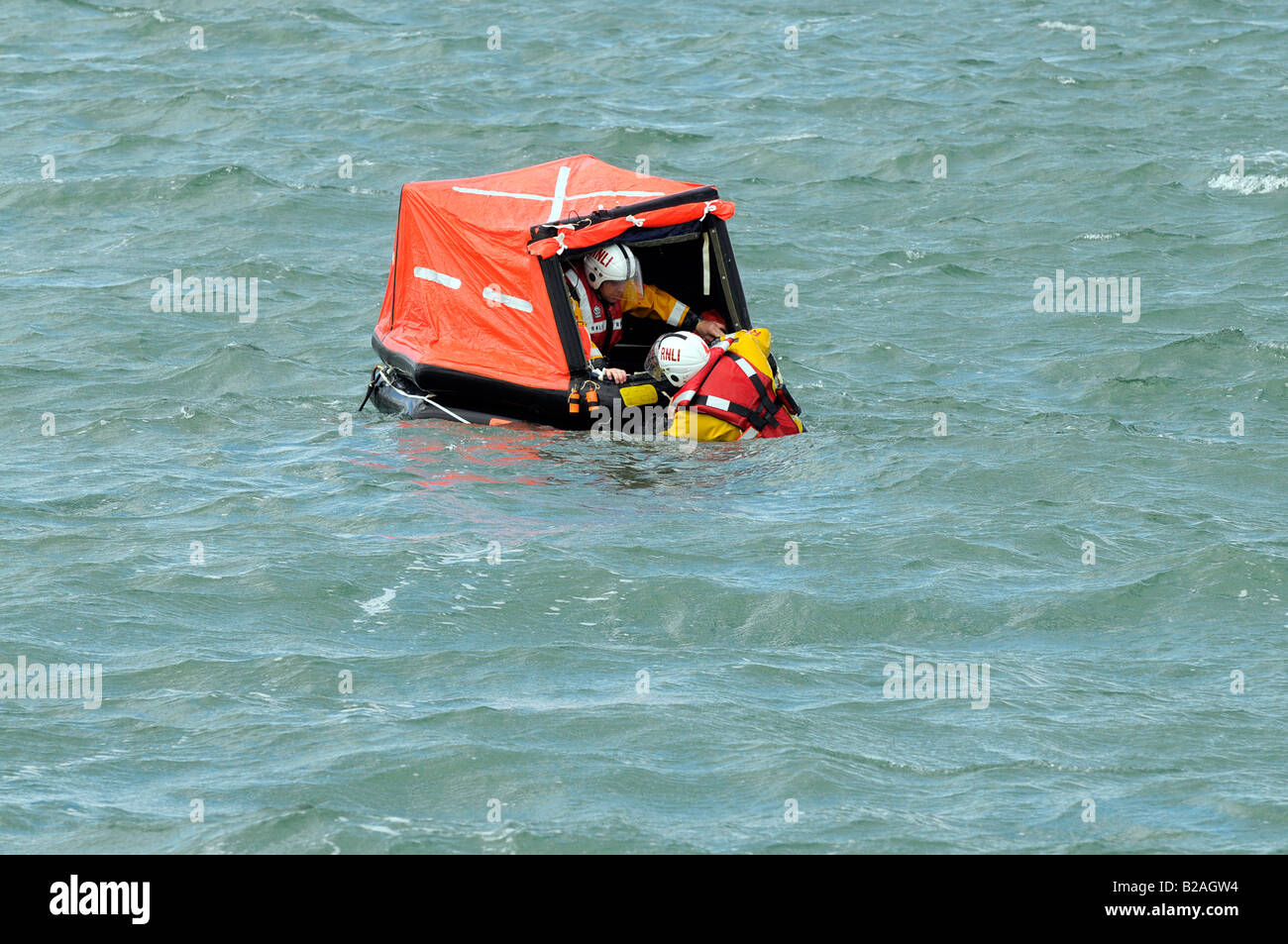 RNLI Crew members aboard an inflatable liferaft during a rescue ...