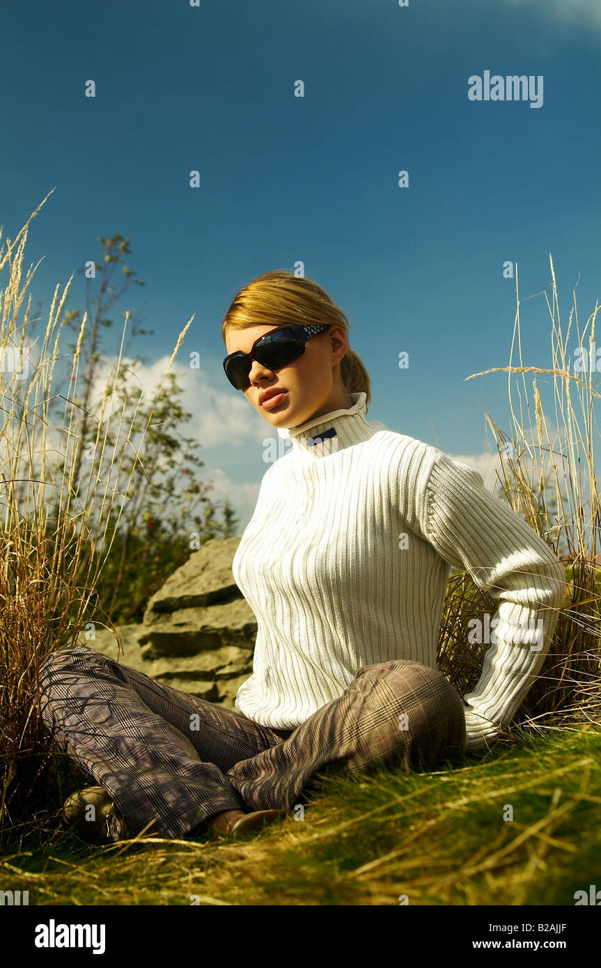 Young beautiful model posing in mountain outdoor scenery Stock Photo ...