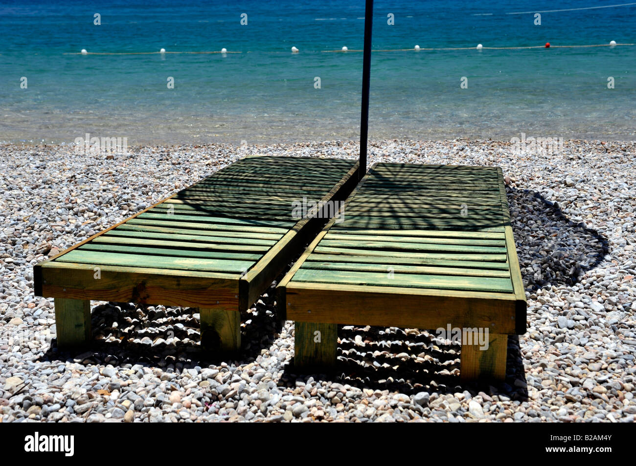 wooden slatted sunbeds Stock Photo - Alamy