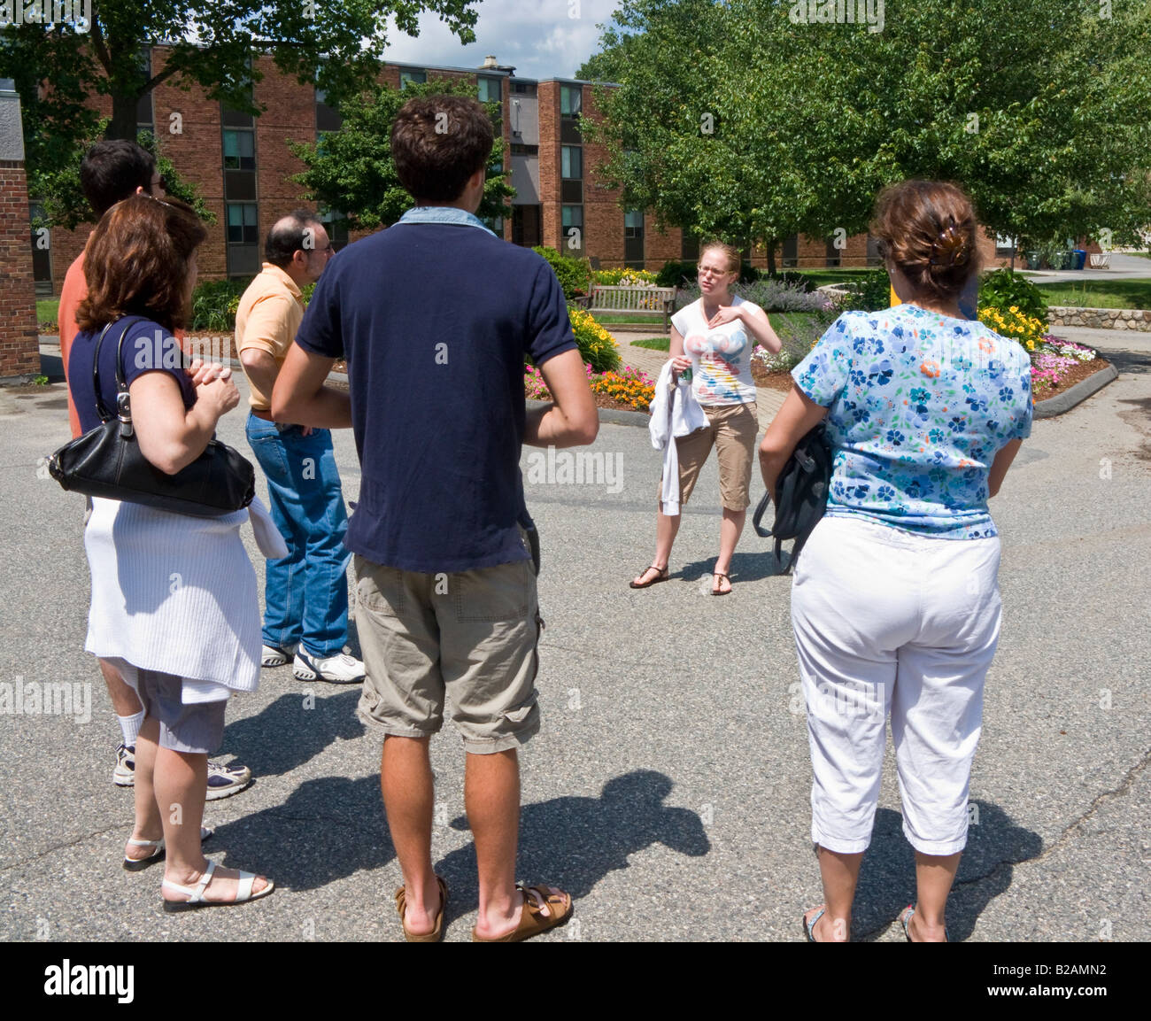 parents and prospective students on student-led admissions office tour ...