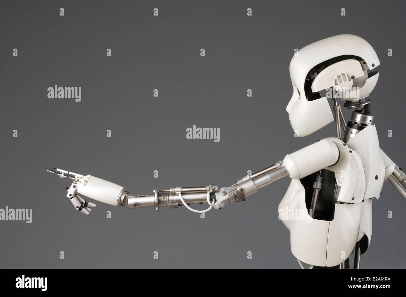 Female robot mannequin pointing Stock Photo - Alamy