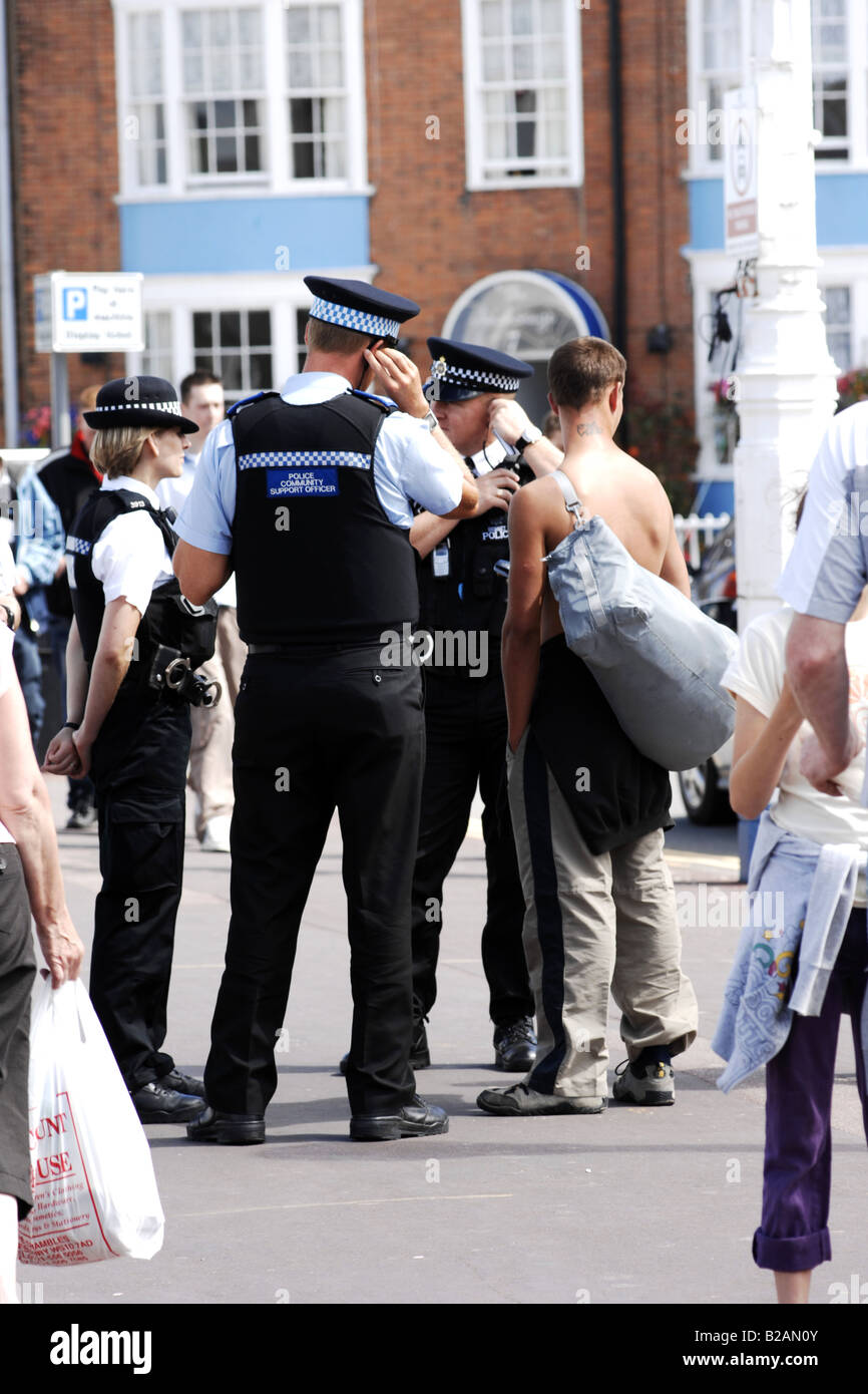 English Police officers questioning youths in relation to carrying ...