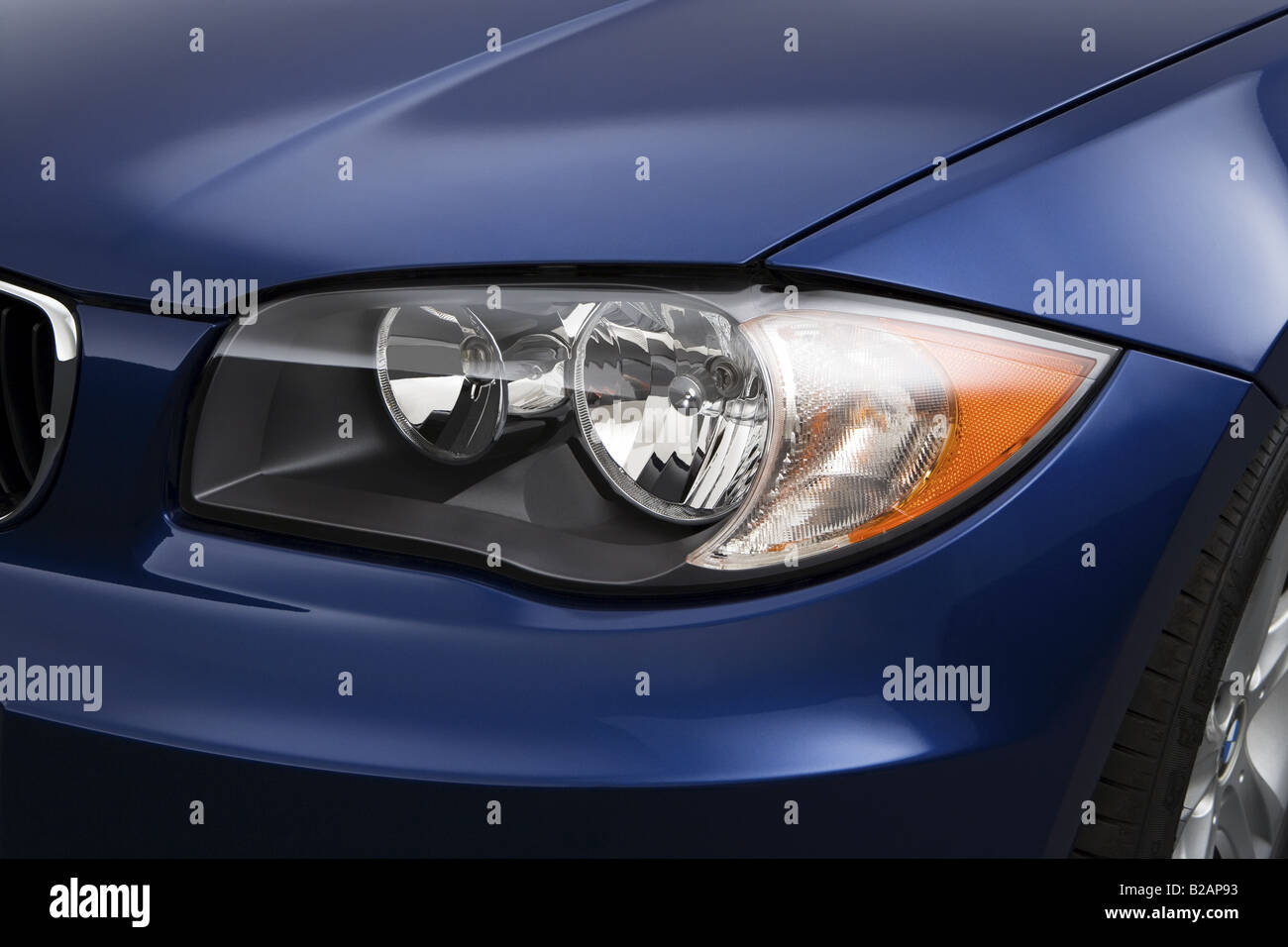 2008 BMW 1-series 128i in Blue - Headlight Stock Photo - Alamy