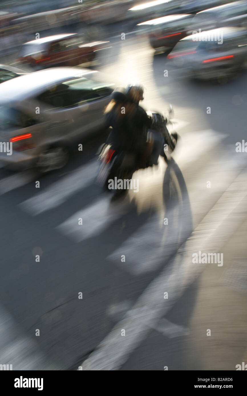 fast speed motorbike on busy street in town Stock Photo - Alamy