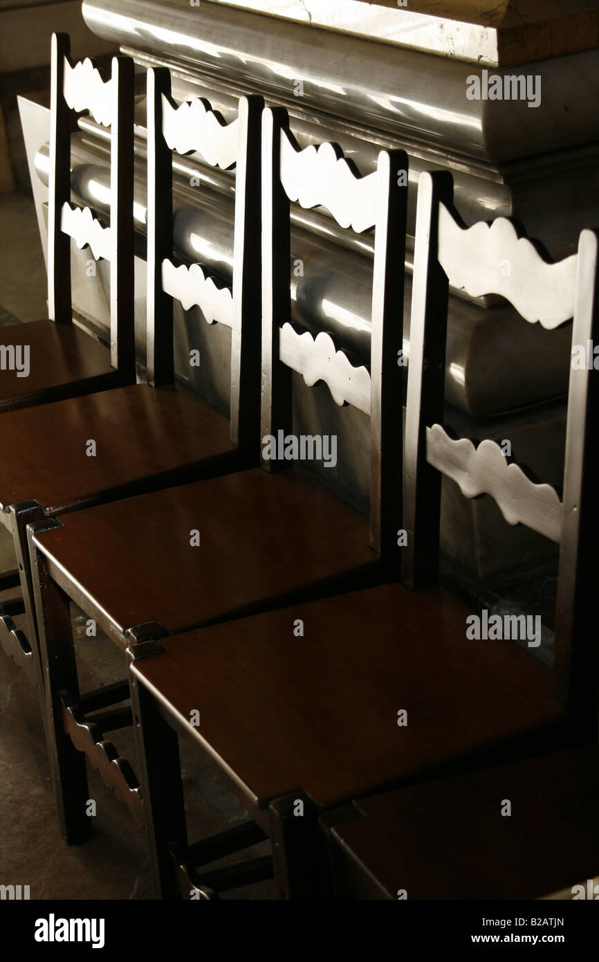 row empty wooden chairs in church, rome, italy Stock Photo - Alamy