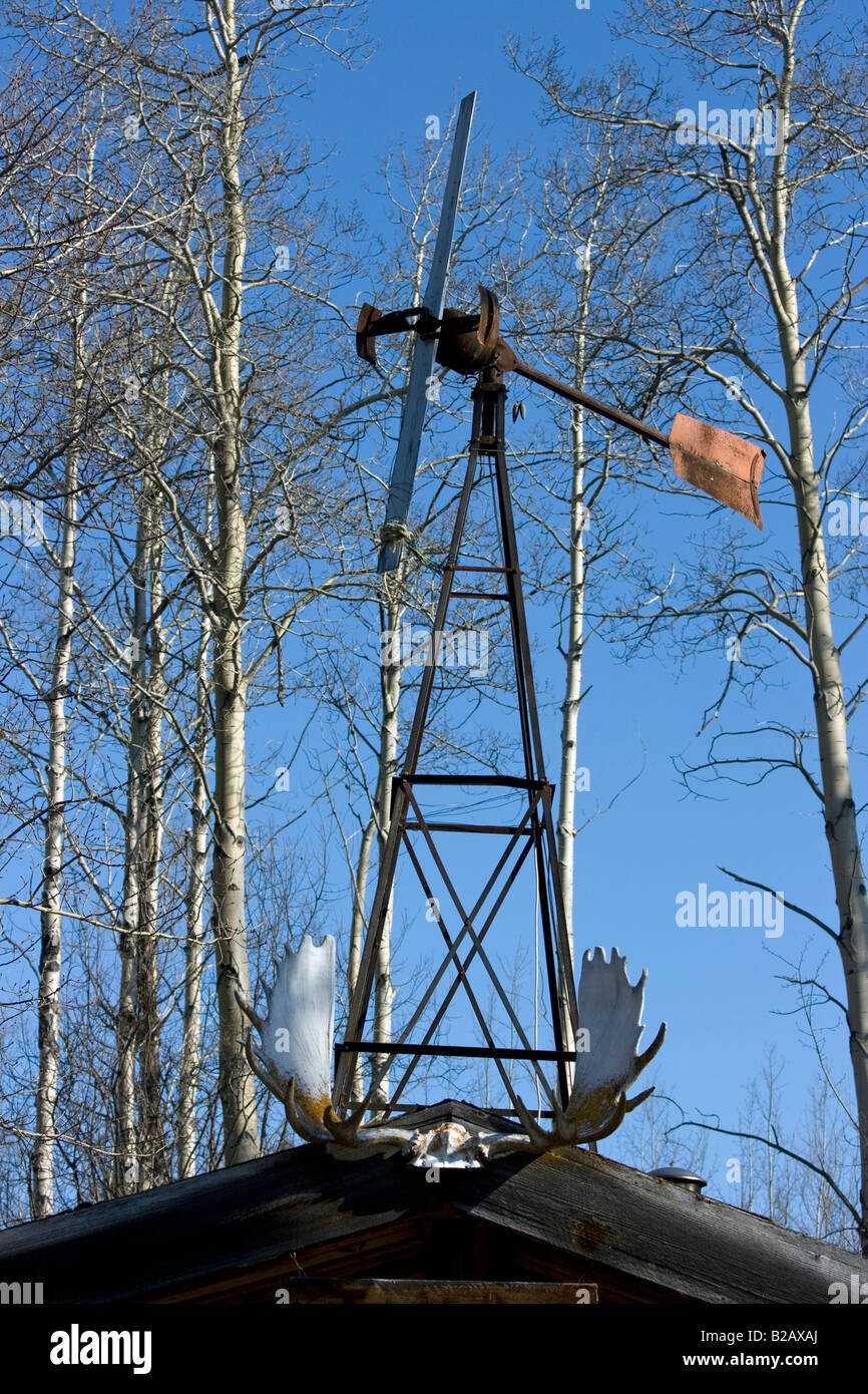 A wind generator of more then thirty years seats atop this cabin. It ...