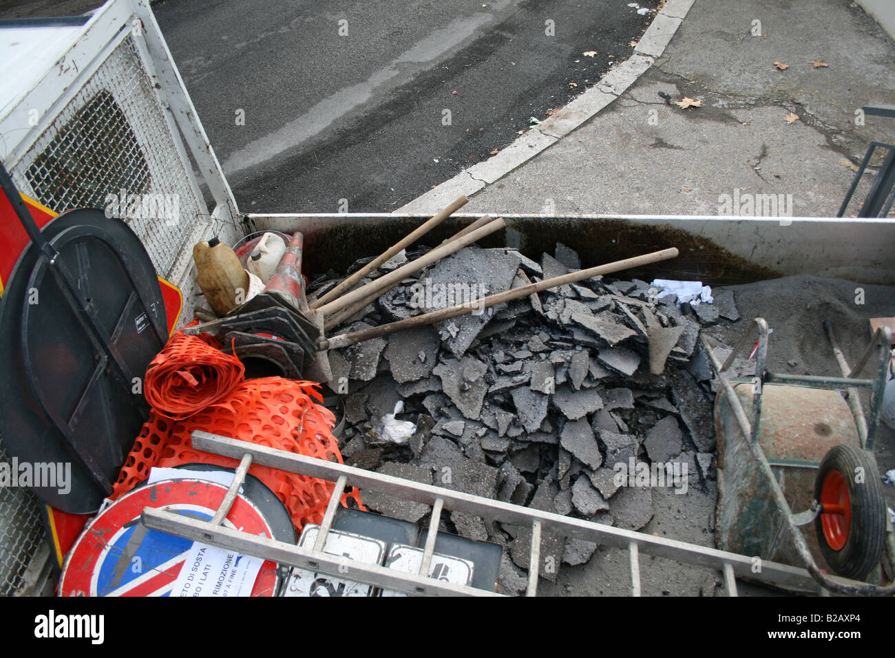 rubble in the back of a council workers truck lorry Stock Photo - Alamy