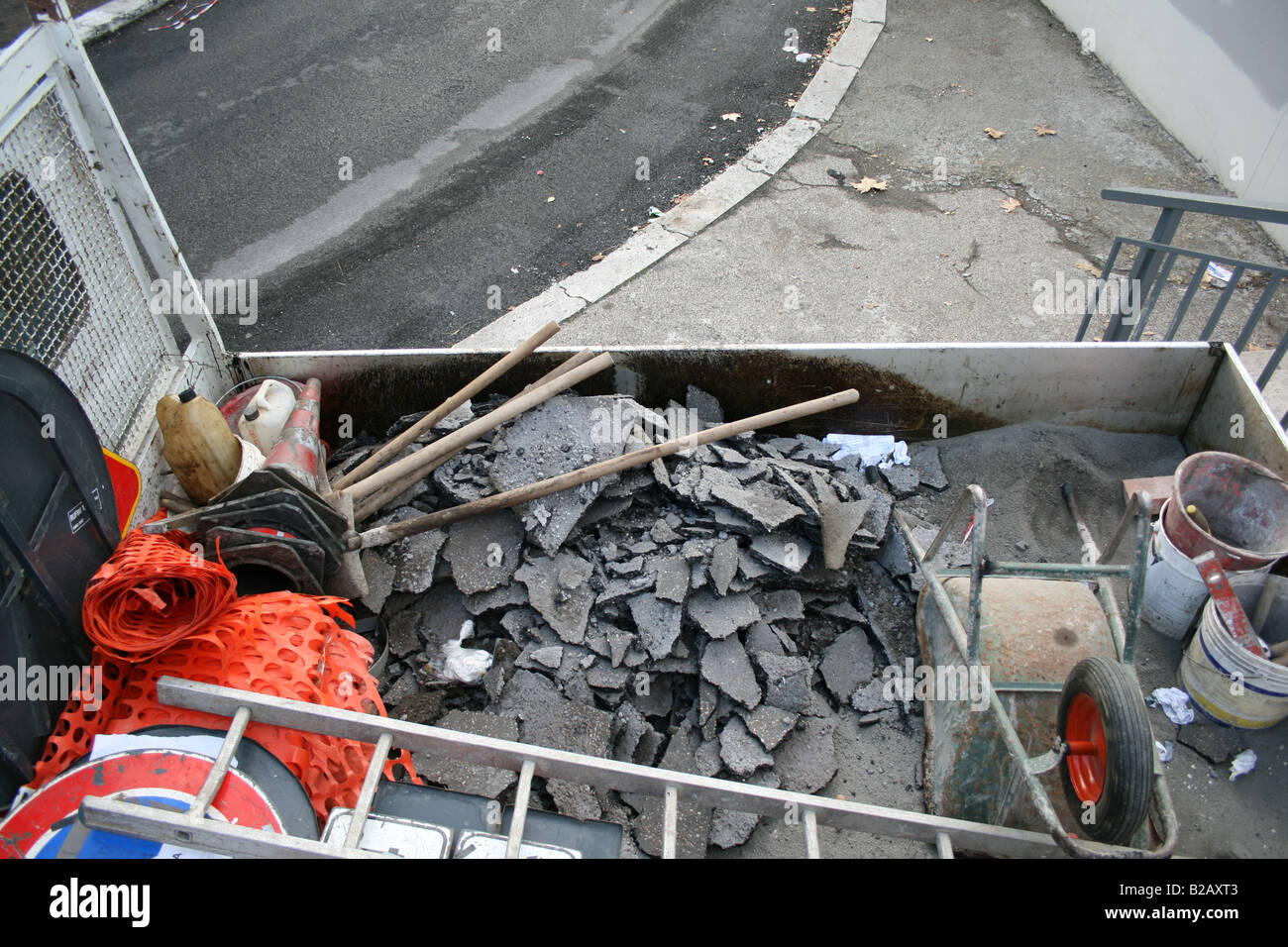rubble in the back of a council workers truck lorry Stock Photo - Alamy