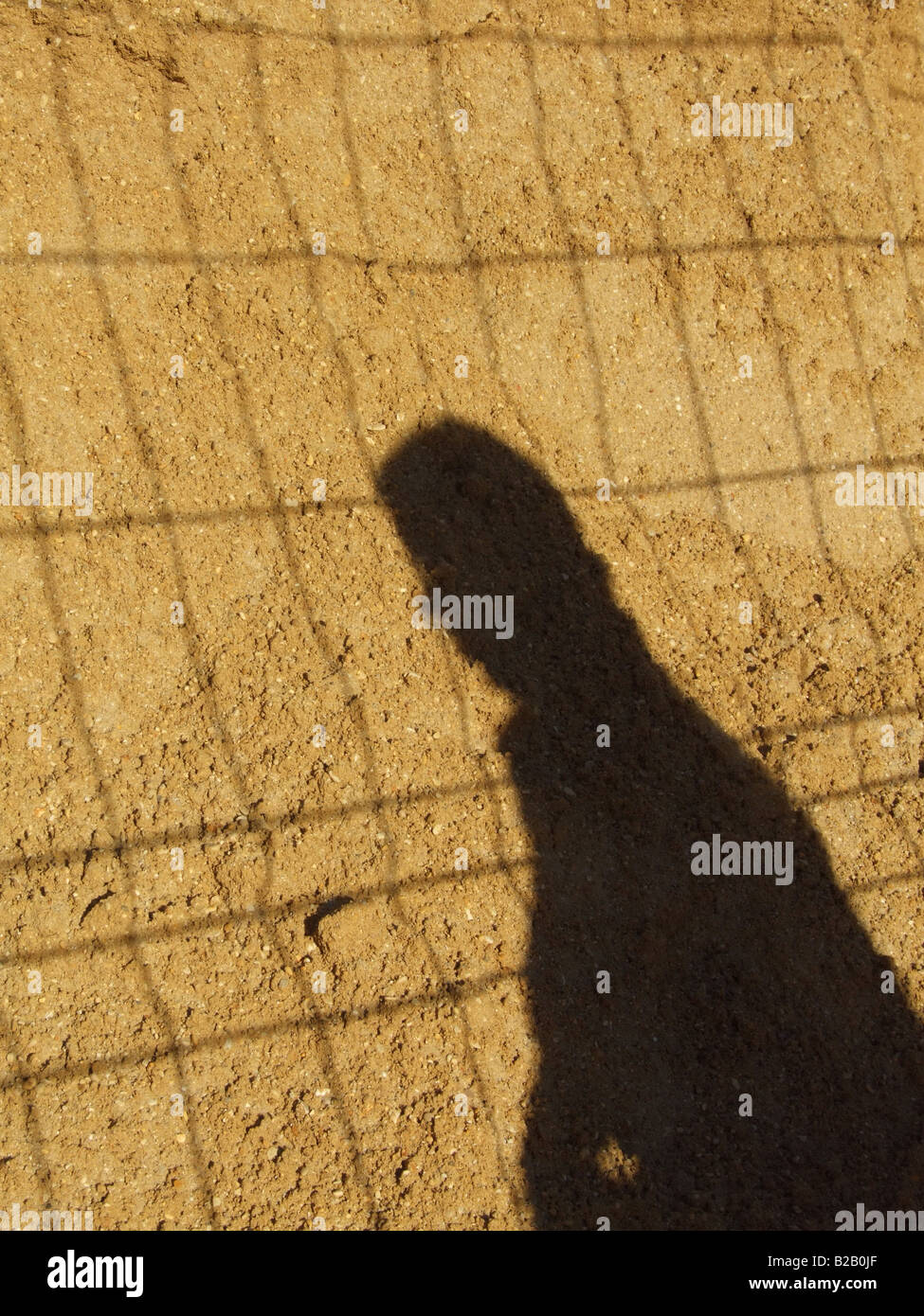 Sinister shadow on sand hi-res stock photography and images - Alamy