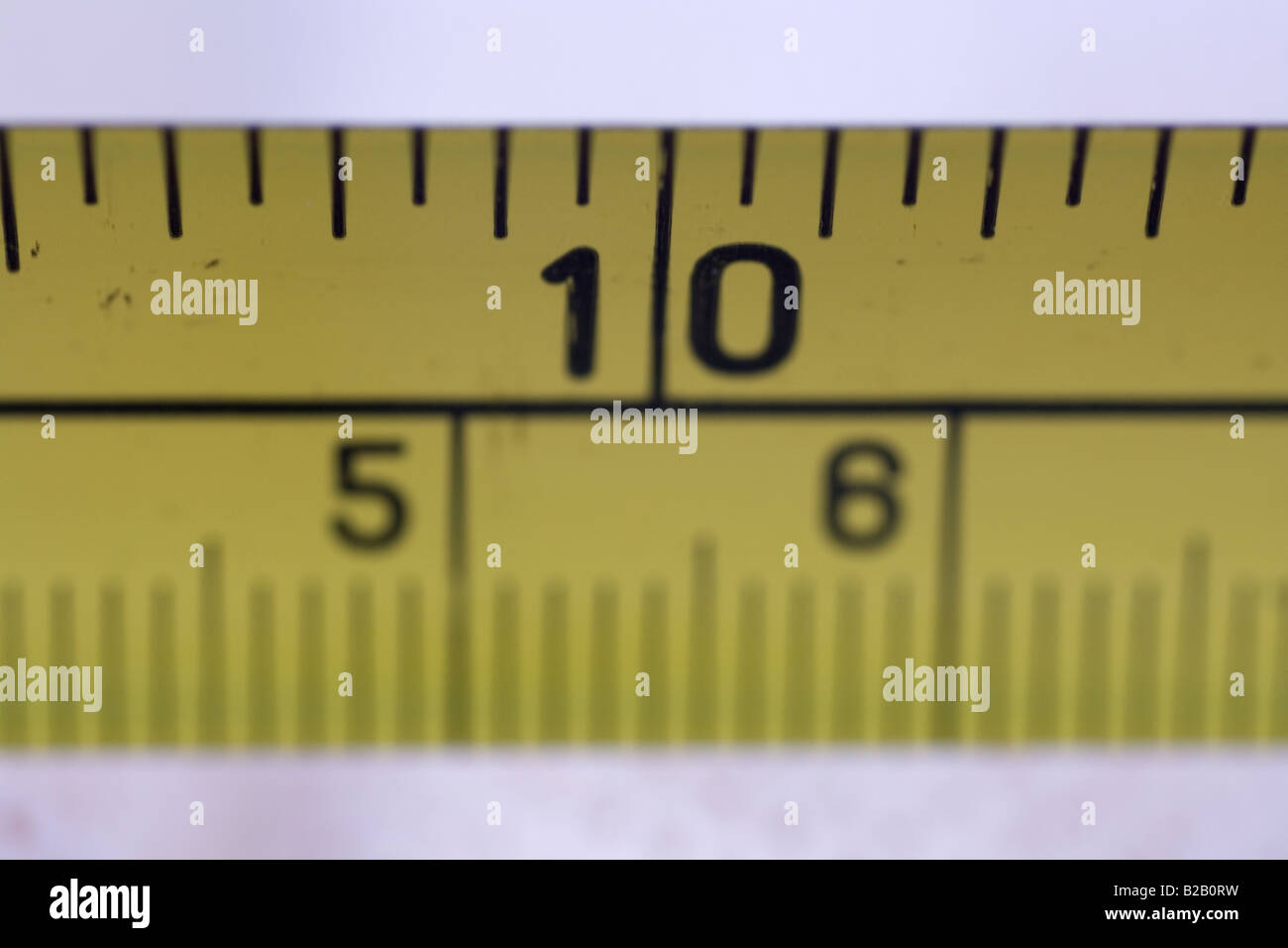 Close up of a metal tape measure Stock Photo - Alamy