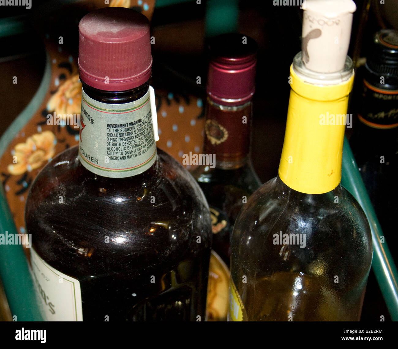 Dusty alcohol bottles Stock Photo - Alamy