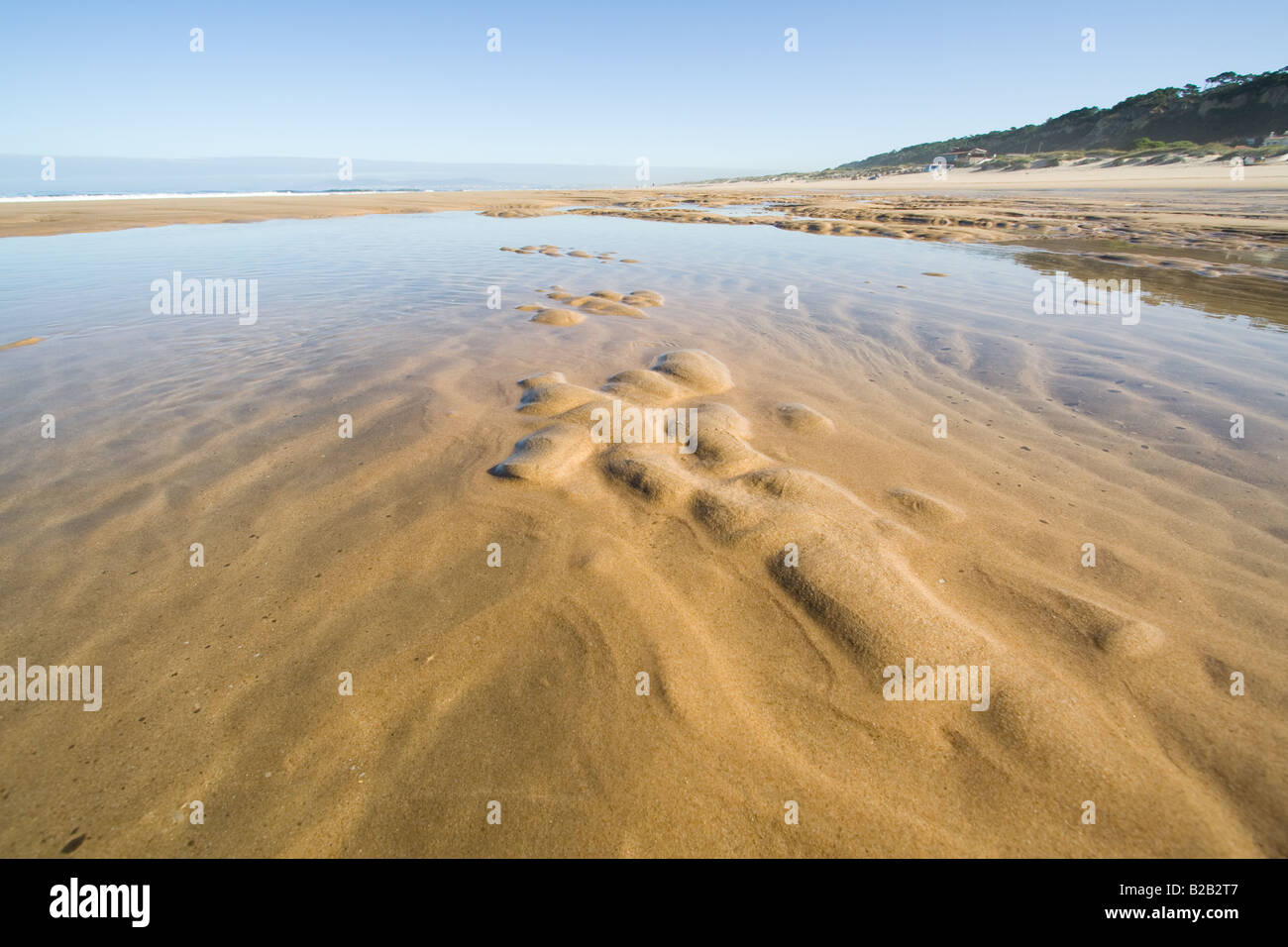 Fonte da Telha Beach in Costa da Caparica coast. Portugal Stock Photo ...