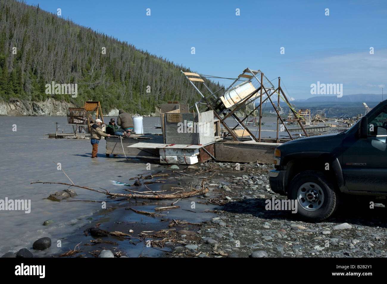 Fishing wheel hauled ashore for repairs, for automated catching of ...
