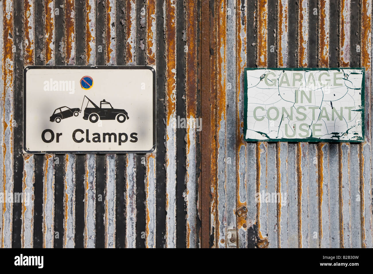 Catalan Bay Gibraltar Signs on garage door Stock Photo - Alamy
