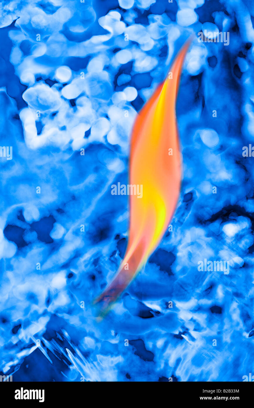 single fire flame on artistic blue background Stock Photo - Alamy