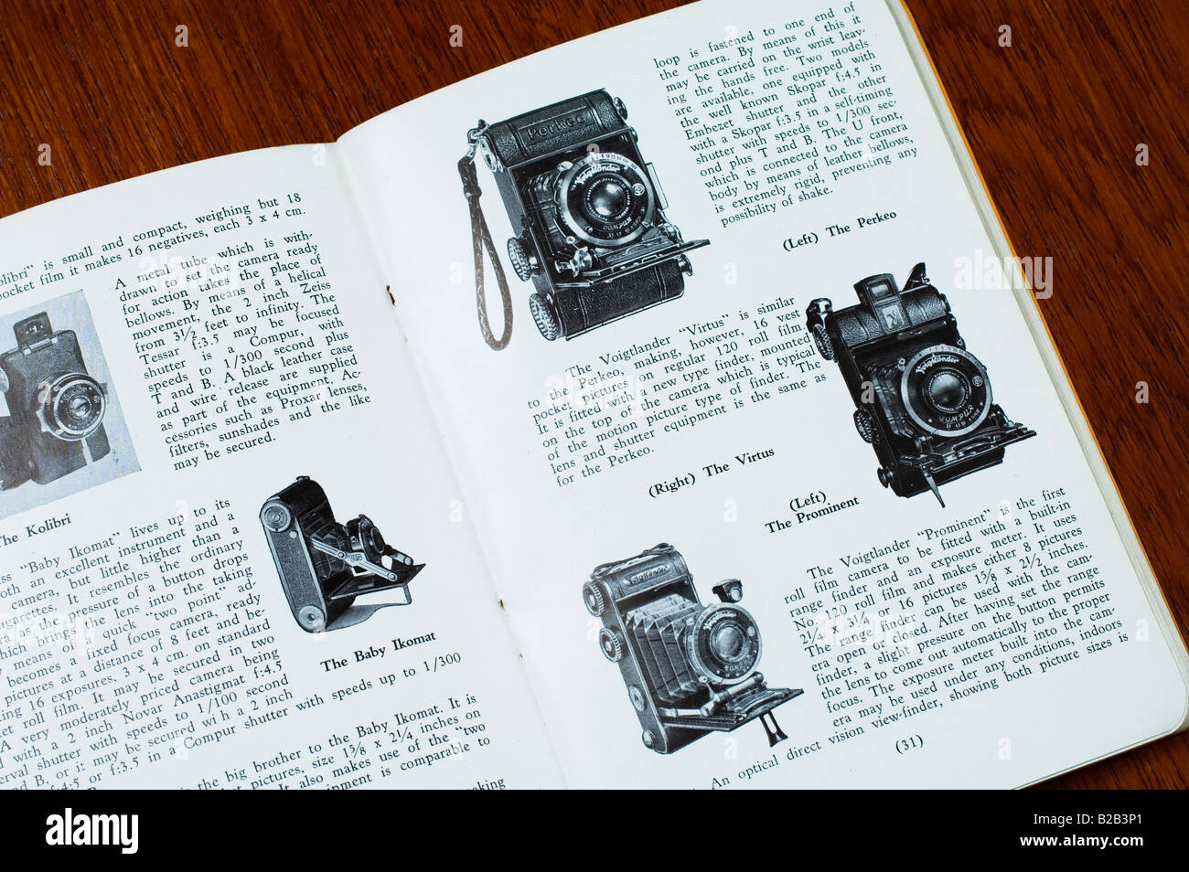Pages in an old photographic manual with pictures of Voigtlander and ...