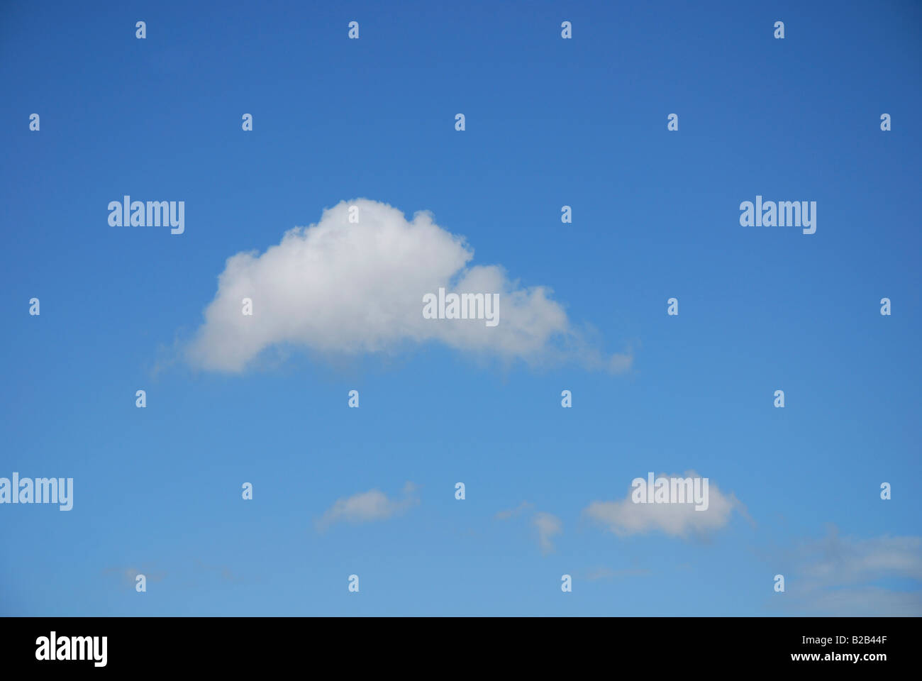 blue skies with single cloud Stock Photo - Alamy