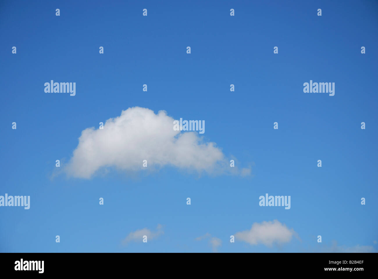 blue skies with single cloud Stock Photo - Alamy