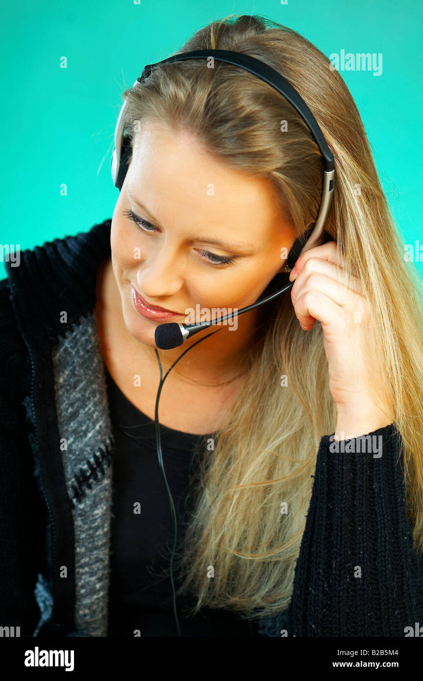 Young pretty woman wearing a phone headset Call Centre Agent Stock ...